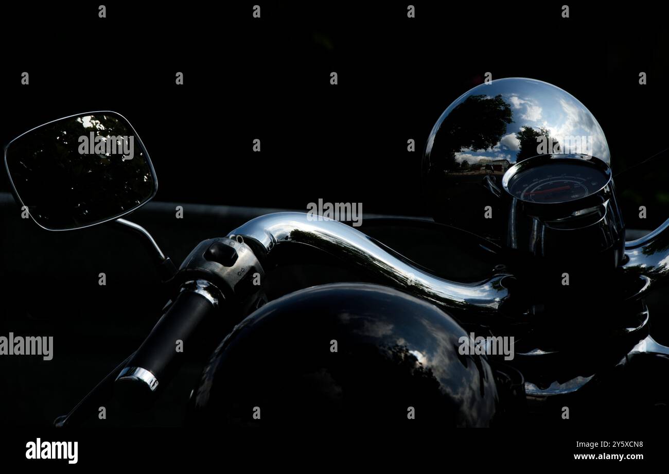 Headlight, handlebar and rearview mirror as appealing chrome parts of ...