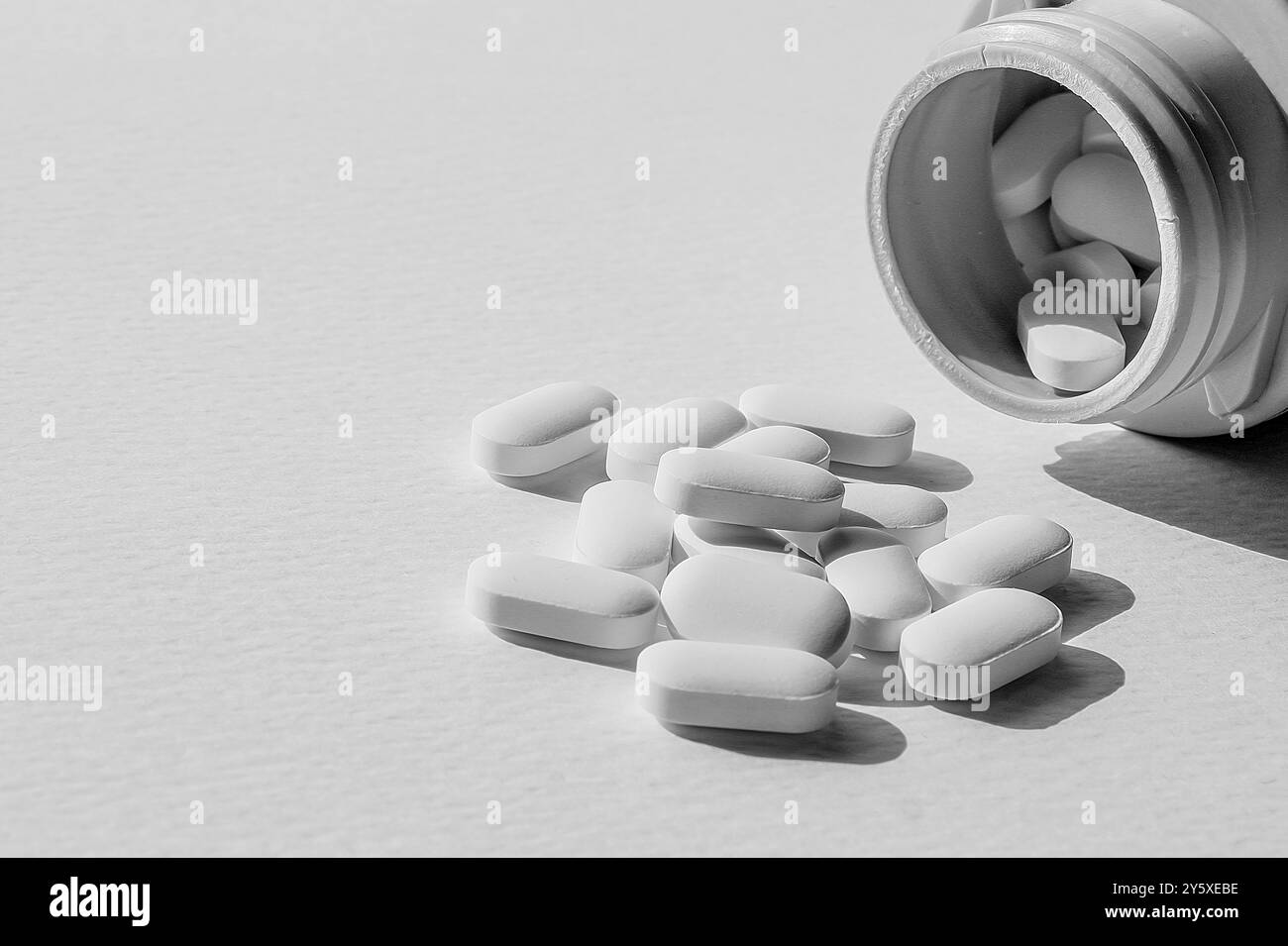 Very high ky photo illustration of Vitamin C tablets on textured ...
