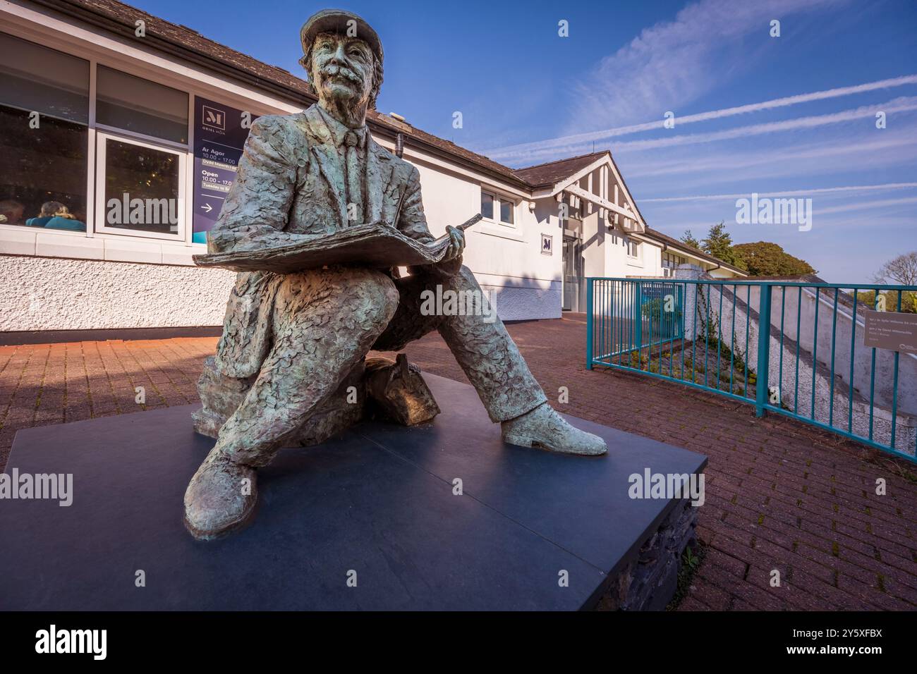 The statue of Sir John Kyffin Williams outside Oriel Mon art gallery ...