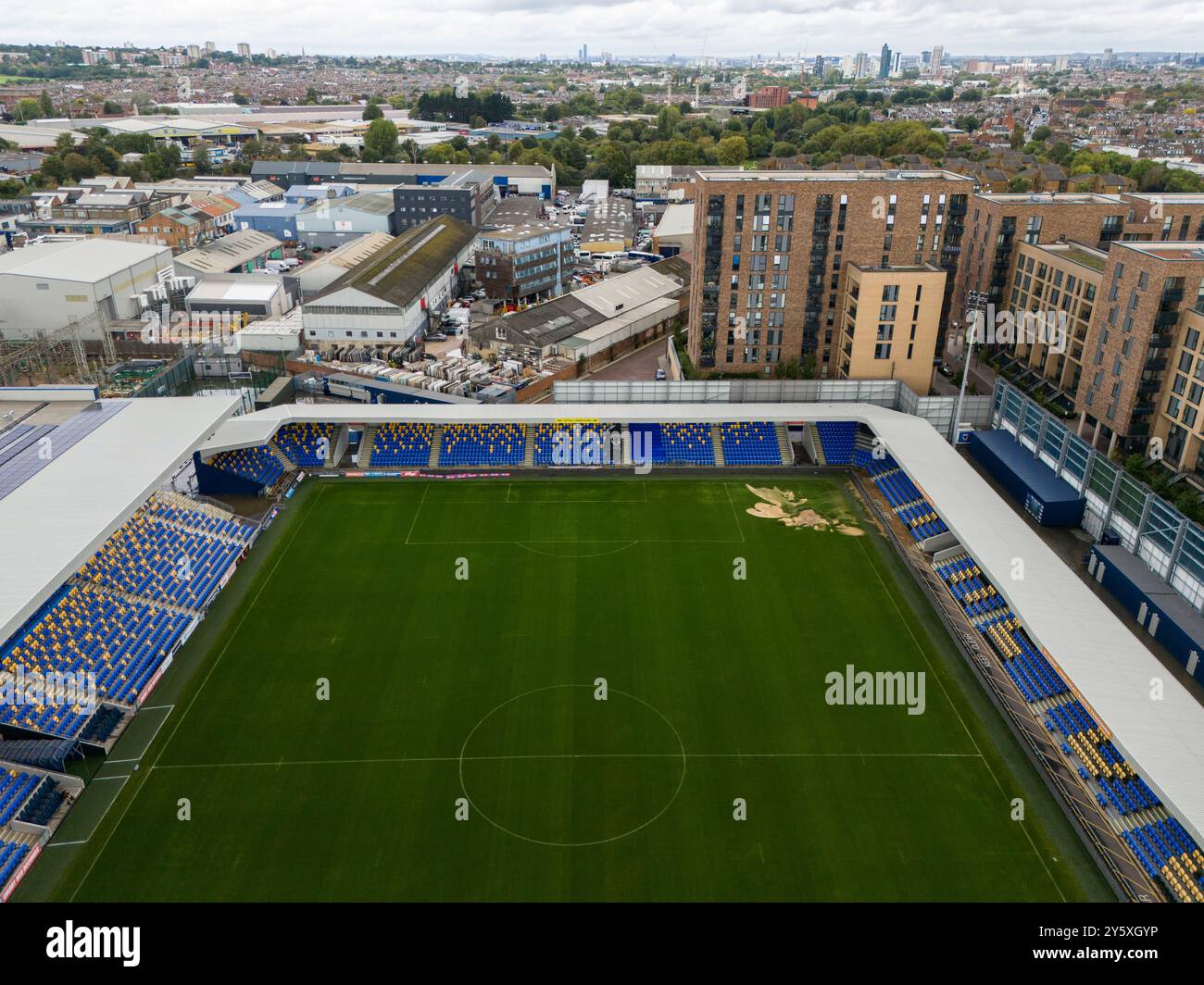 A sinkhole on the pitch at the Cherry Red Records Stadium, home of AFC ...