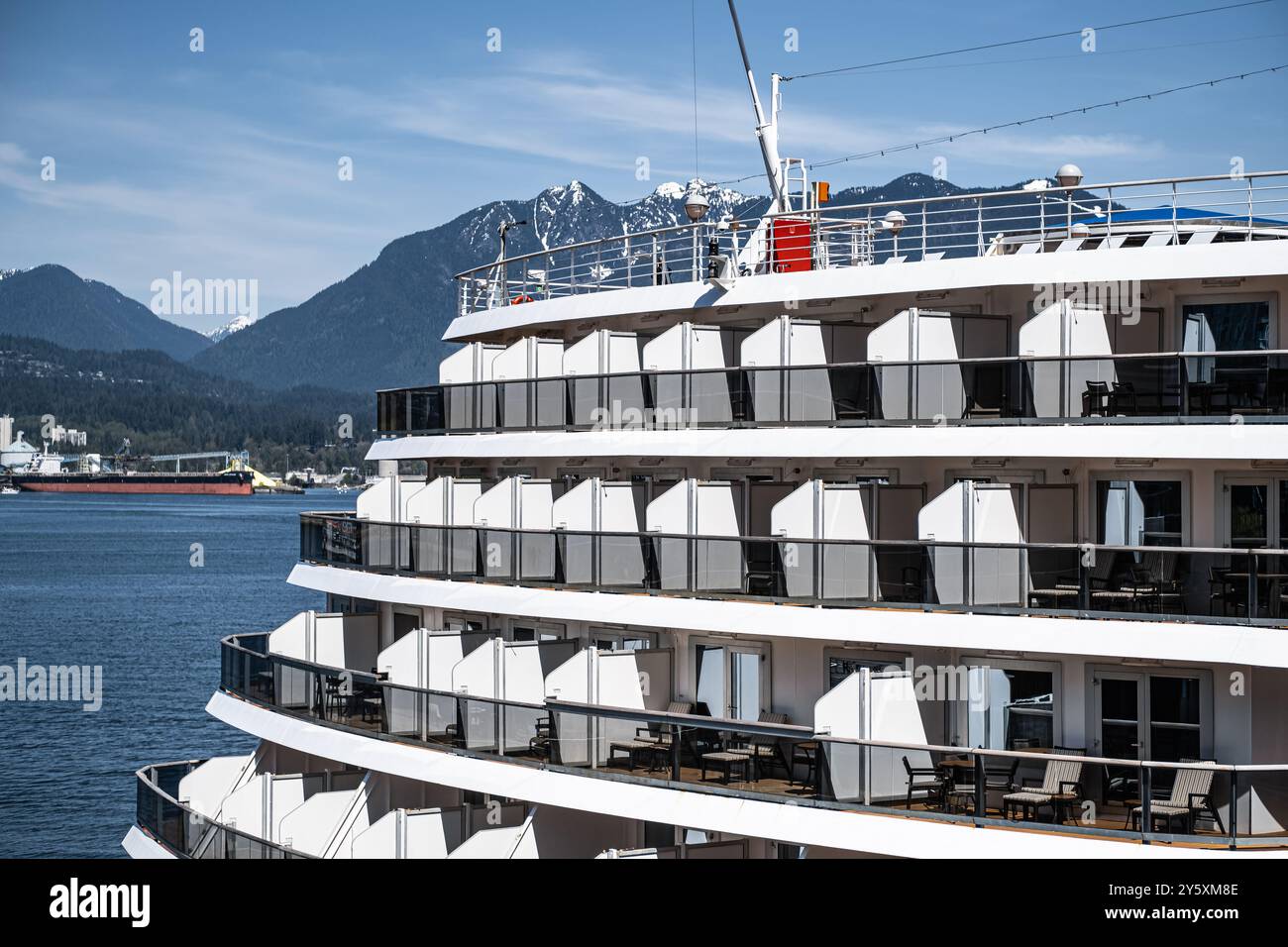 View of cruise ship on a sunny day. Cruise liner cabins and balconies ...
