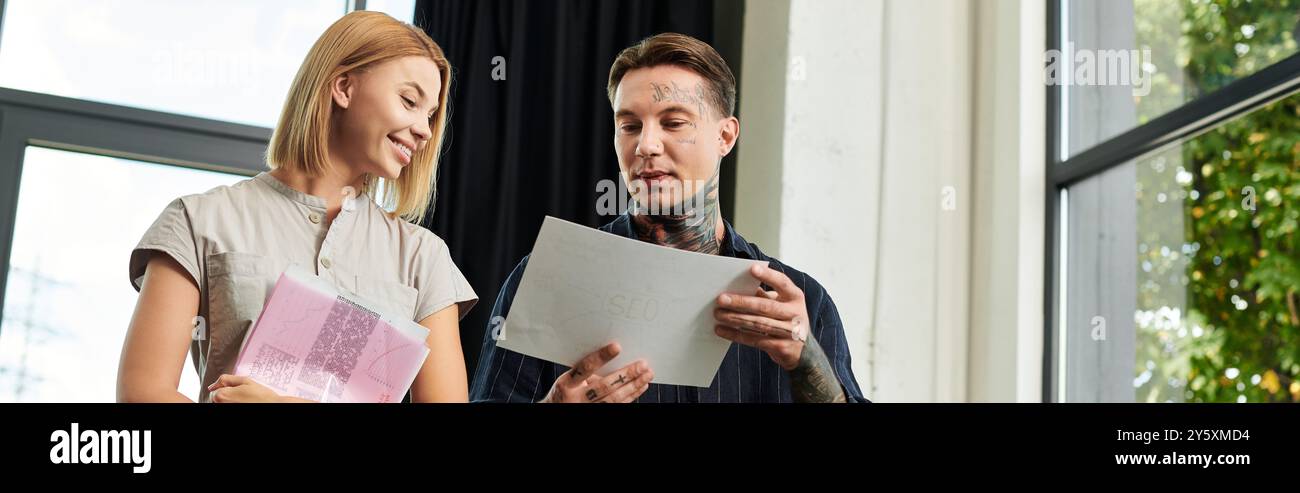 Two colleagues engage in collaborative hi-res stock photography and images - Alamy