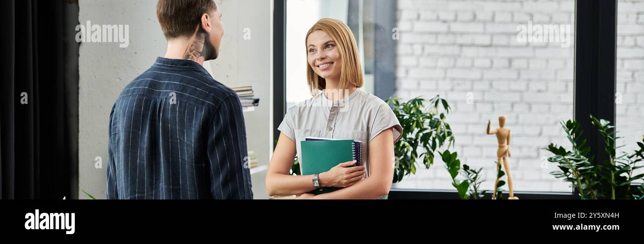 Colleagues engage in a friendly discussion while sharing ideas and ...