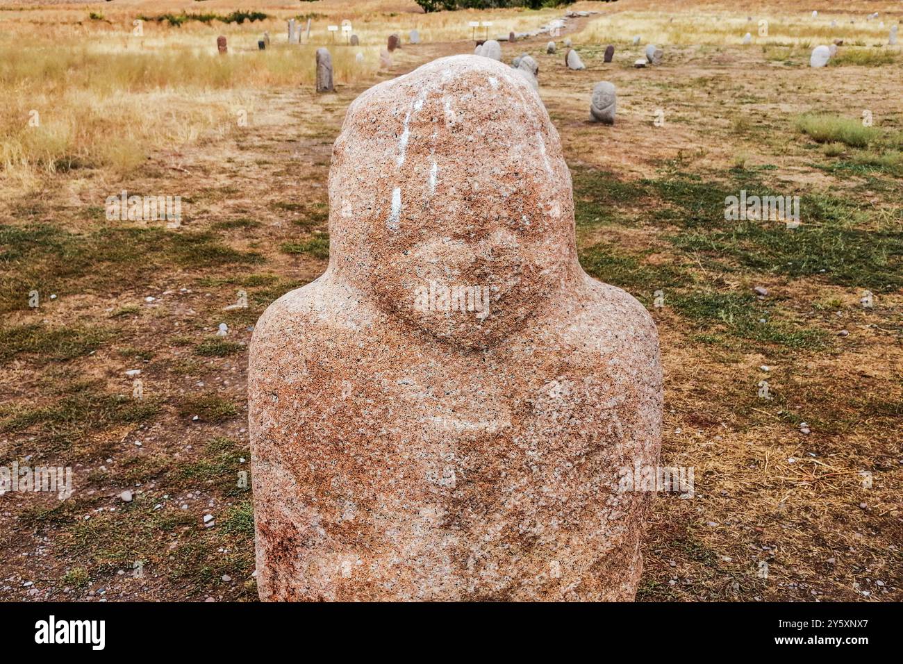 Kyrgyzstan, historic stone statue sculpture near Burana Tower in the ...