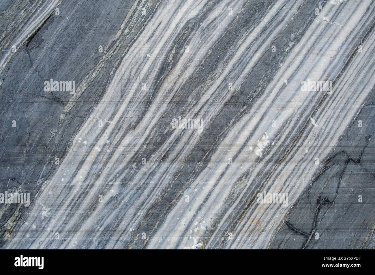 Layers of gray marble exhibit stunning white veining, showcasing the ...