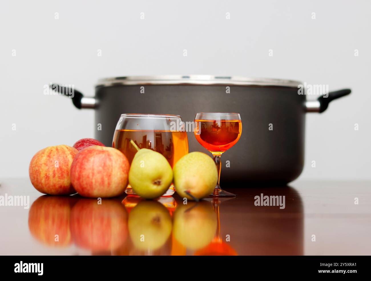Glass Of Fruit Cider with Some Fruits and Stockpot. Bright Background ...