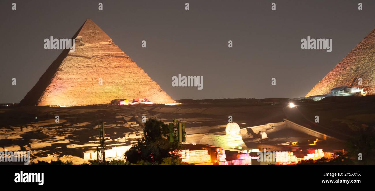 The Great Pyramid complex enlighted at night, Giza, Egypt Stock Photo ...