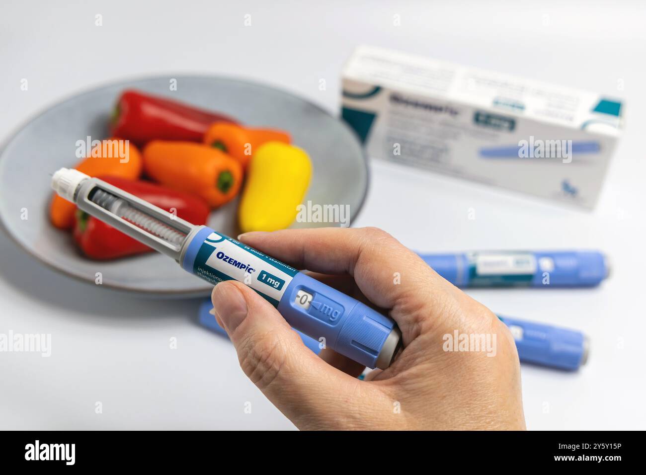Ozempic Insulin injection pen for diabetics and weight loss and plate with vegetables. Denmark ...