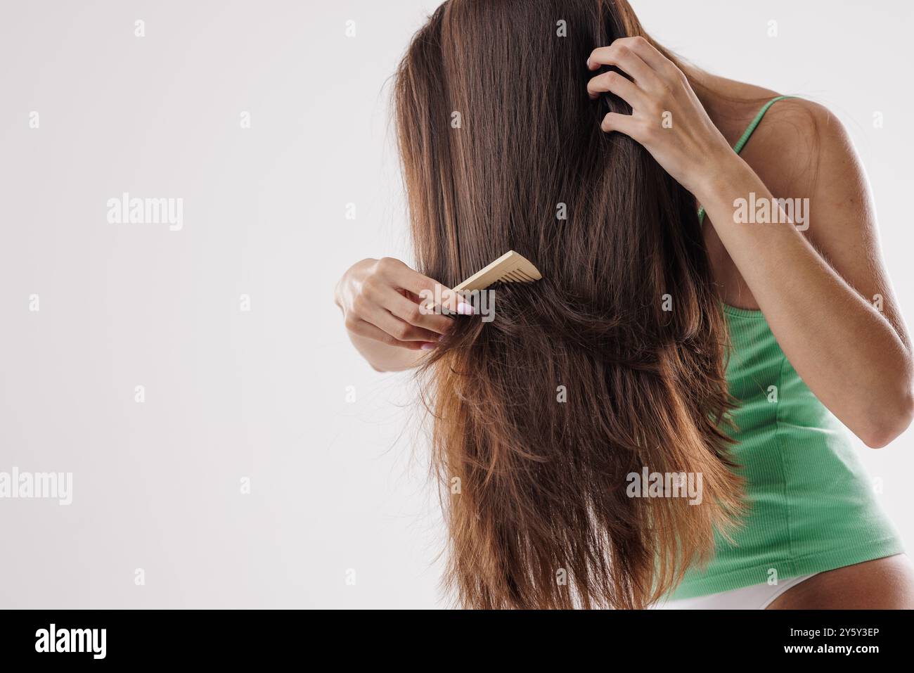 Massage comb combing hair hi-res stock photography and images - Alamy