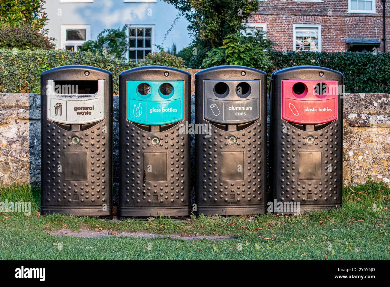 Recycling and general waste collection bins in a rural location. Credit ...