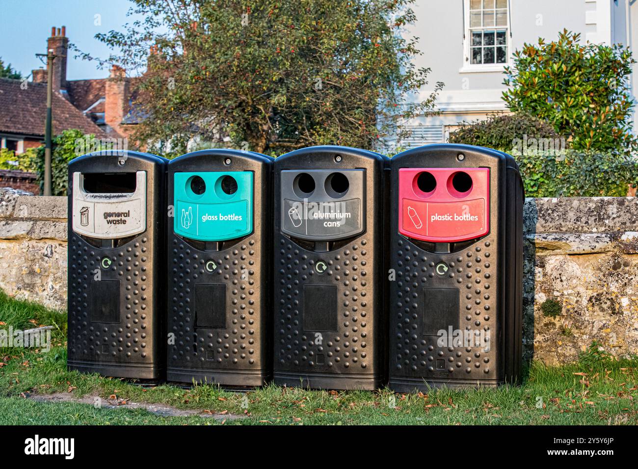 Recycling and general waste collection bins in a rural location. Credit ...