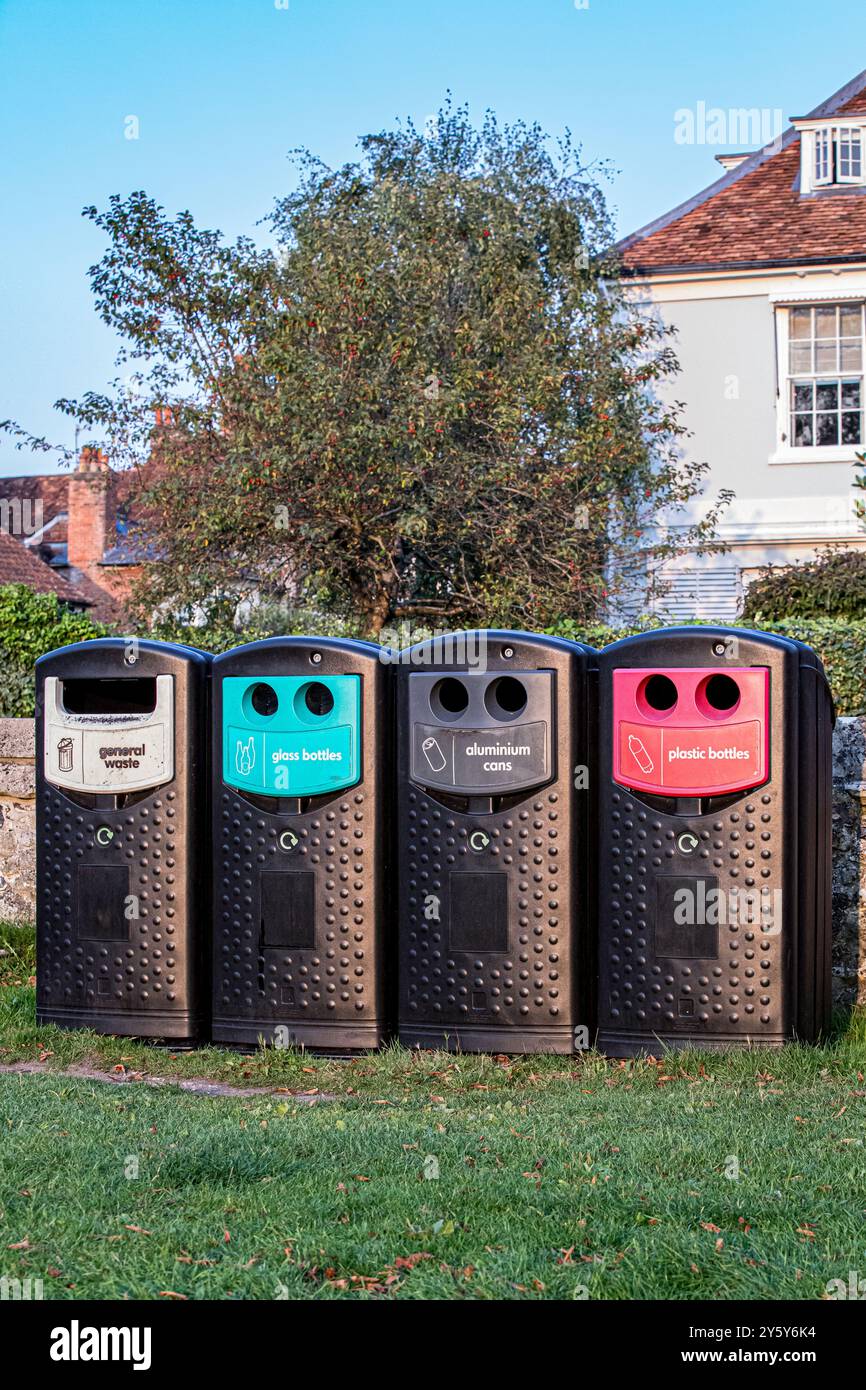 Recycling and general waste collection bins in a rural location. Credit ...