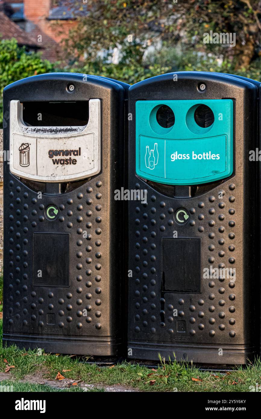 Recycling and general waste collection bins in a rural location. Credit ...