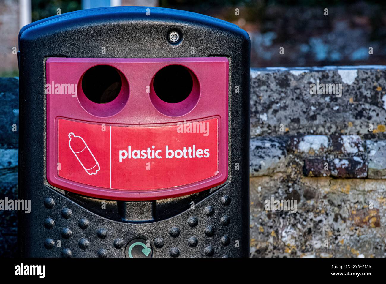 Recycling and general waste collection bins in a rural location. Credit ...