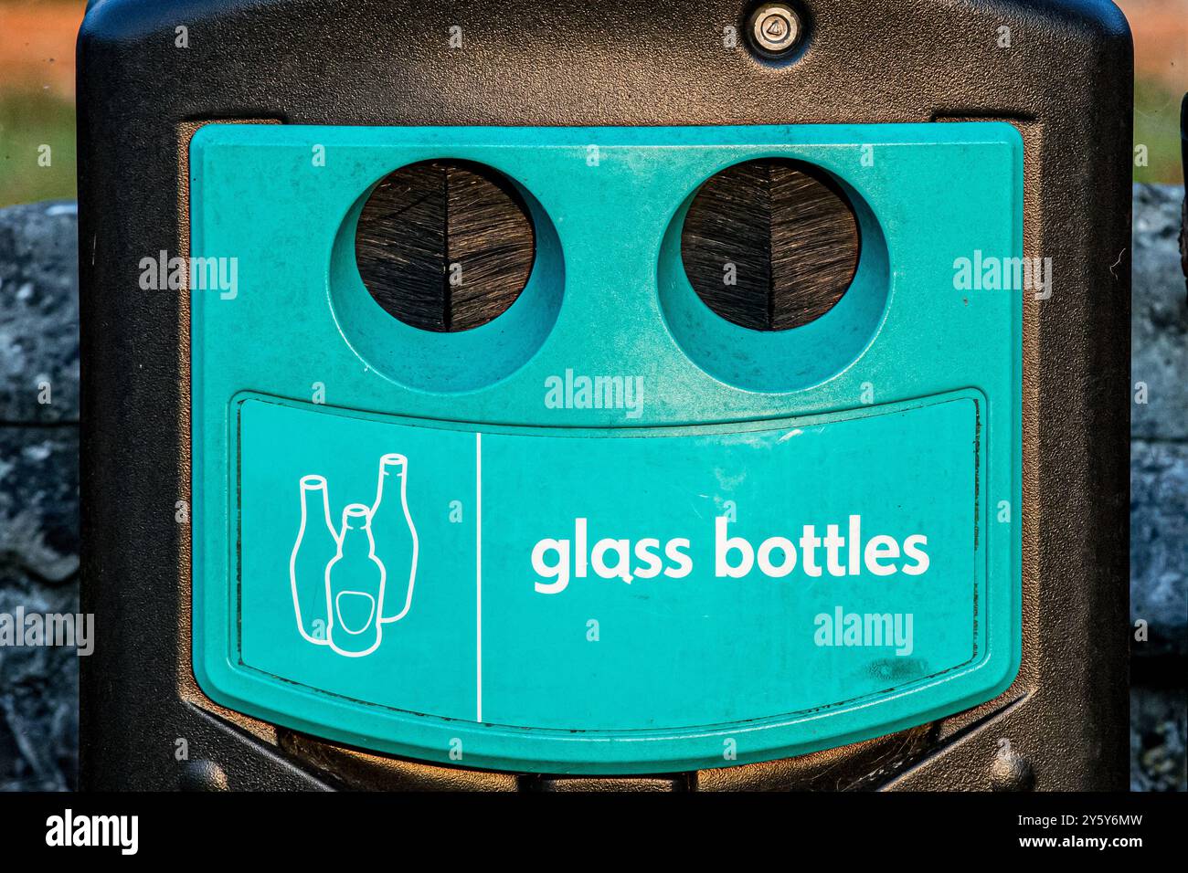 Recycling and general waste collection bins in a rural location. Credit ...