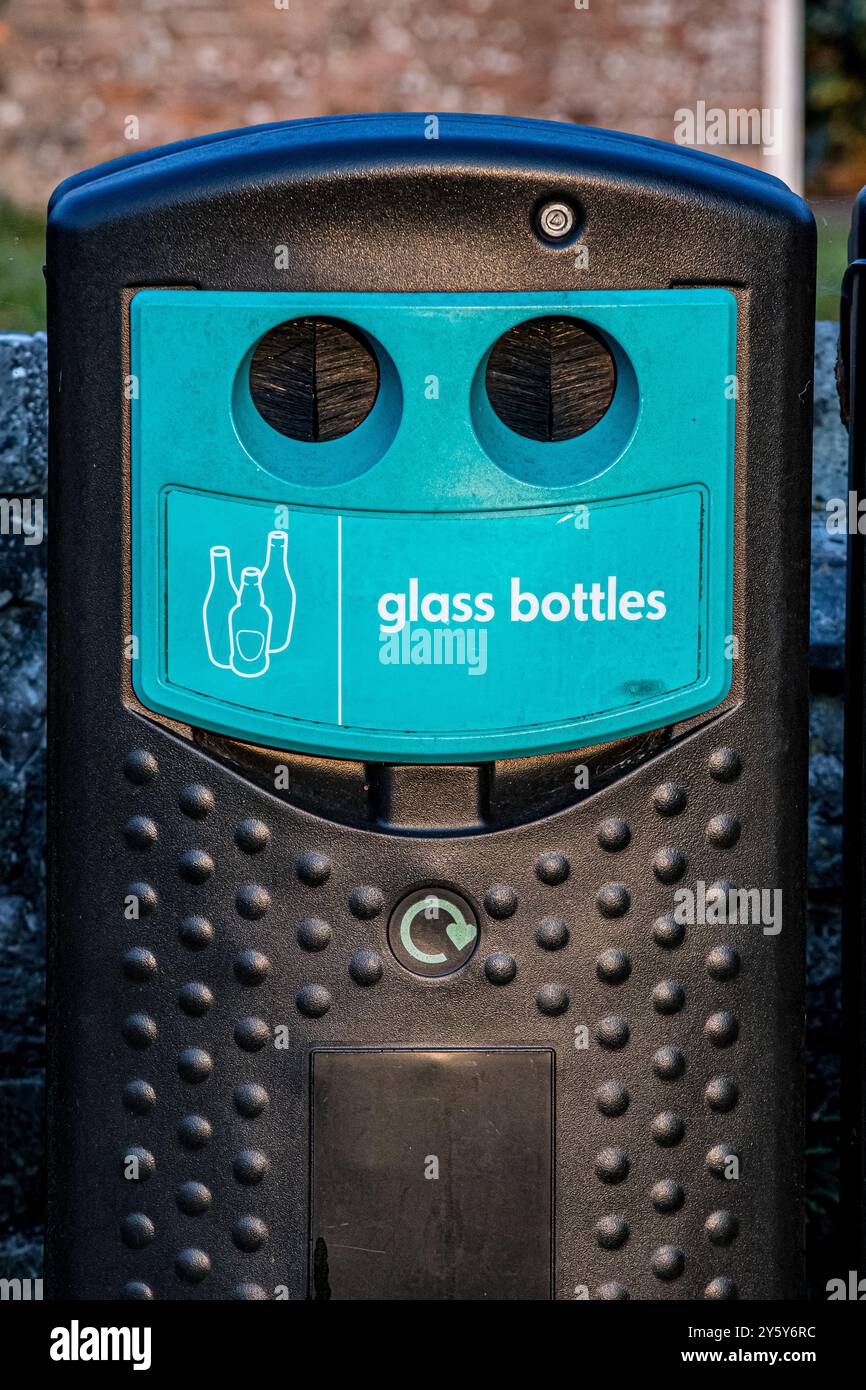 Recycling and general waste collection bins in a rural location. Credit ...