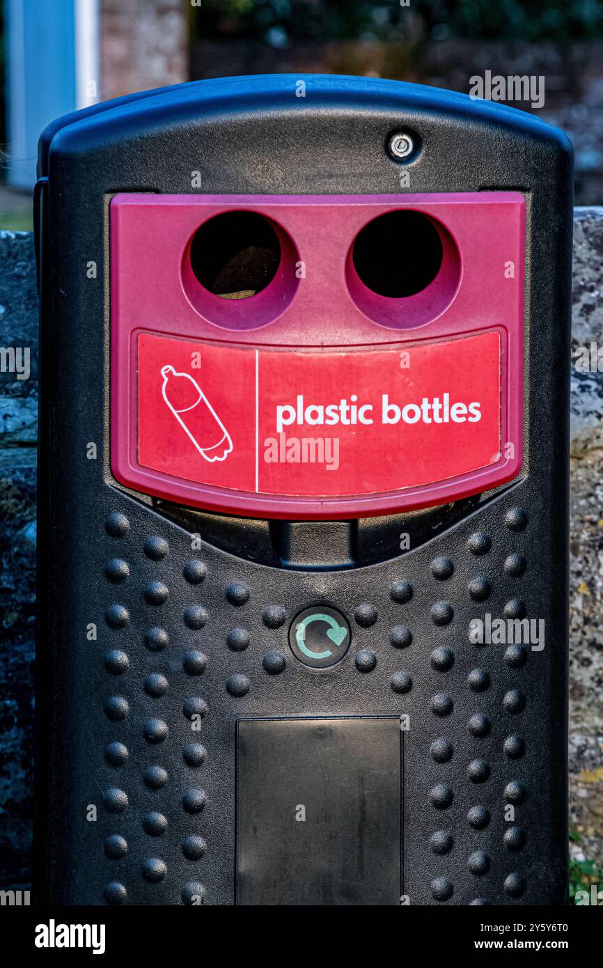 Recycling and general waste collection bins in a rural location. Credit ...