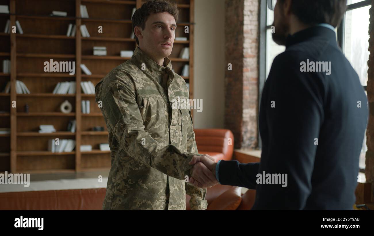 Serious Caucasian male officer in camouflage Ukraine uniform man ...