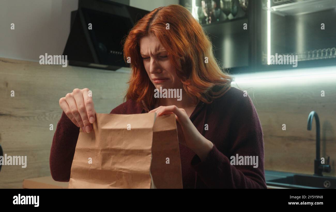 Shocked disgusted Caucasian hungry woman female client girl customer ...