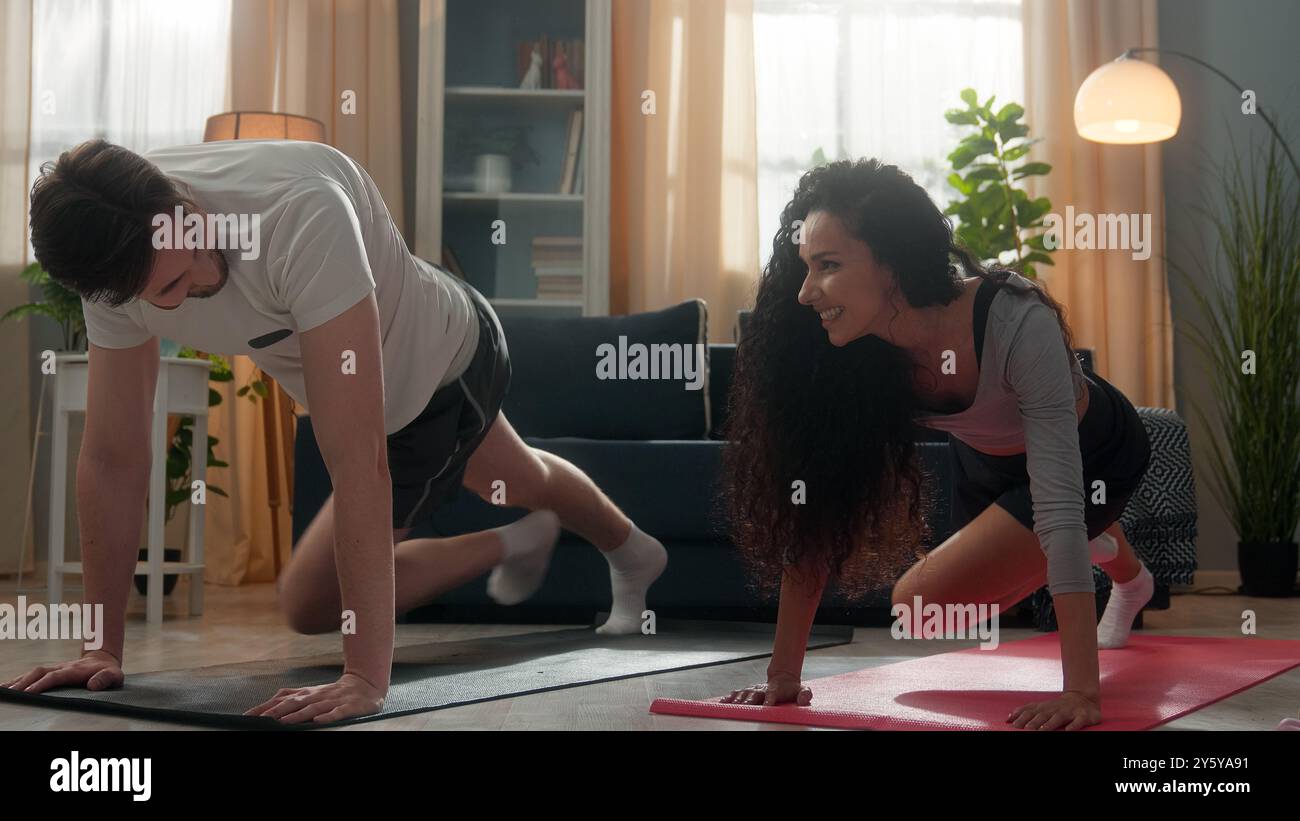 Happy smiling couple Hispanic girlfriend woman female girl exercising ...