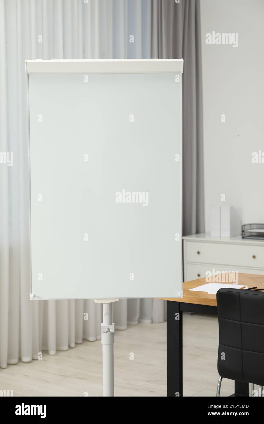Flip chart in conference room. Mockup for design Stock Photo - Alamy