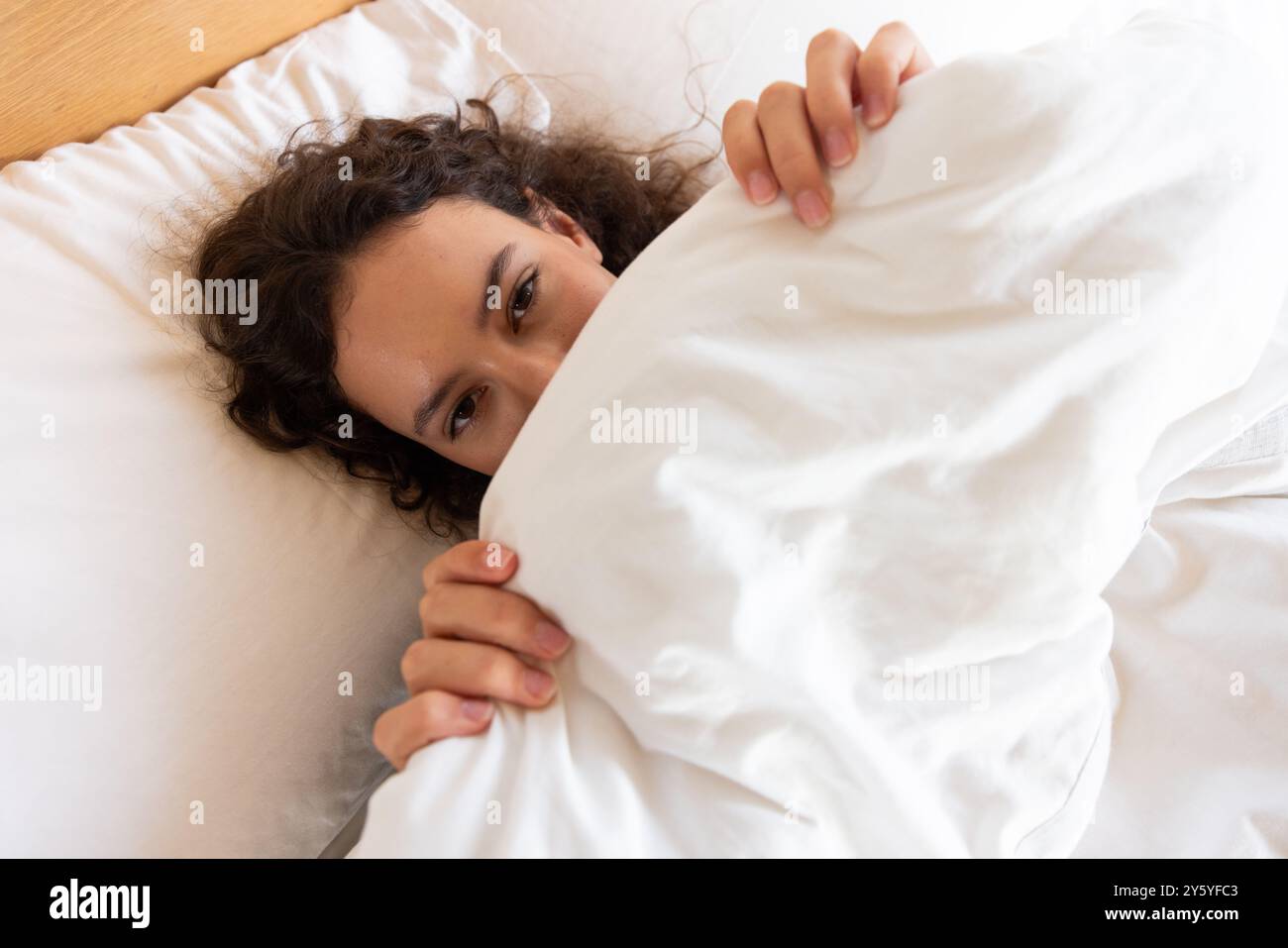 Woman enjoying comfort under blanket hi-res stock photography and ...