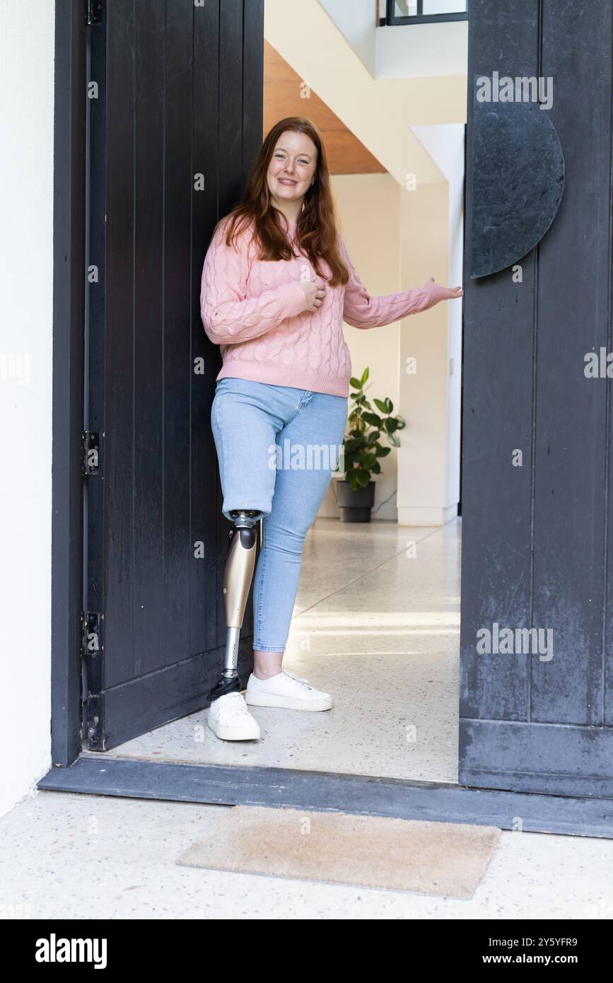 Welcoming women friends, woman with prosthetic leg smiling and opening ...