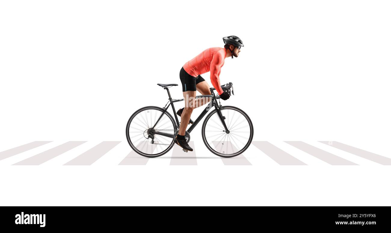 Cyclist with helmet and sunglasses riding a bicycle on a street ...