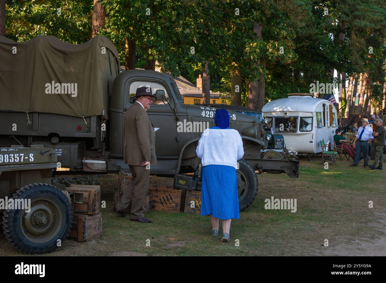 Holt, Norfolk, UK - SEPTEMBER 21 2024: Man and woman dressed in 1940s ...