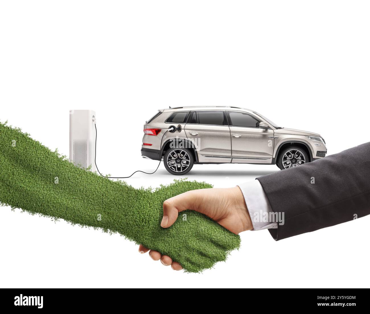 Businessman shaking hand with a hand covered in grass in front of ...