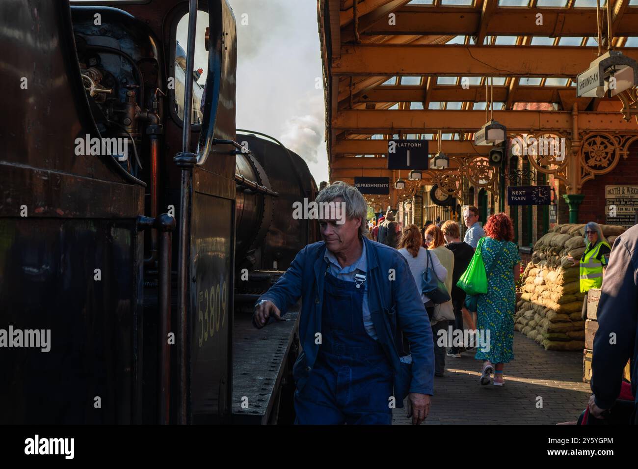 Sheringham, Norfolk, UK - SEPTEMBER 21 2024: Man in 1940s train ...