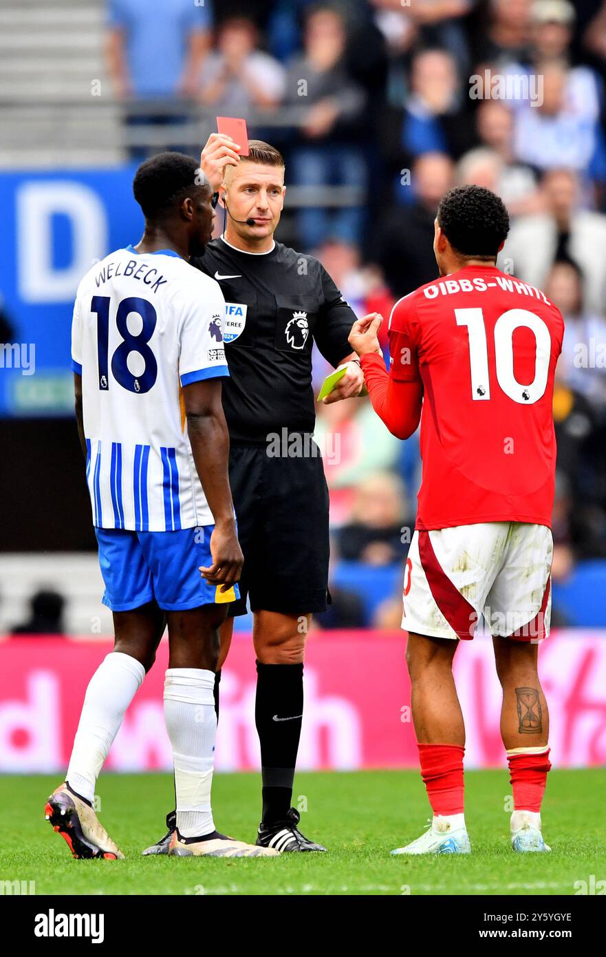 Morgan Gibbs-White of Nottingham Forest fouls Joao Pedro of Brighton ...