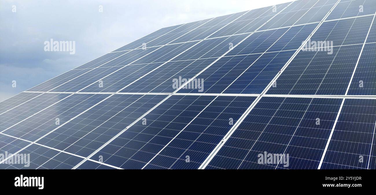 Solar panels on the background of a natural landscape. The construction ...