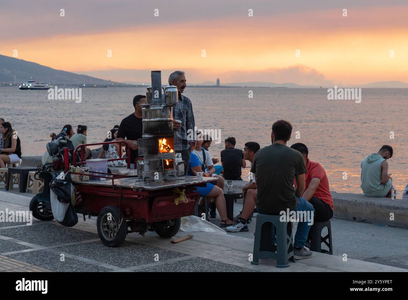 August 2024 - Izmir: scenic sunset view with people and the sea Stock ...