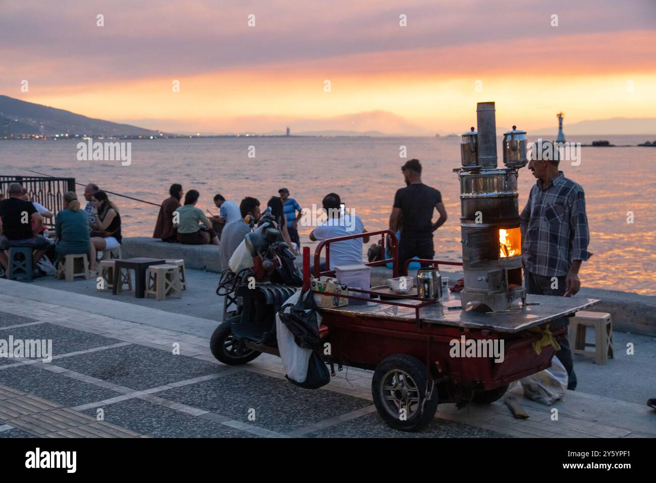 August 2024 - Izmir: scenic sunset view with people and the sea Stock ...