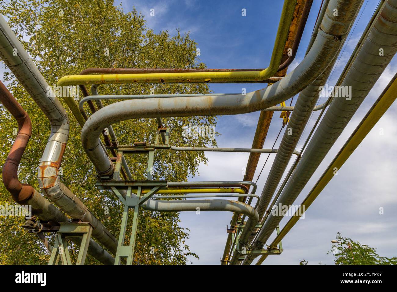 Old rusty pipeline, heating installation, water flow through old pipes ...