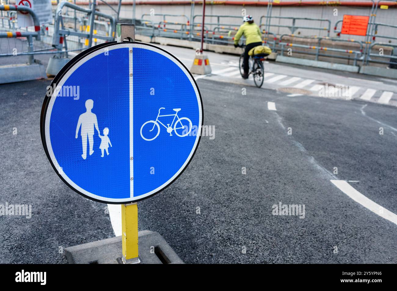 Shared use path sign for pedestrians and bicycles in an European city ...