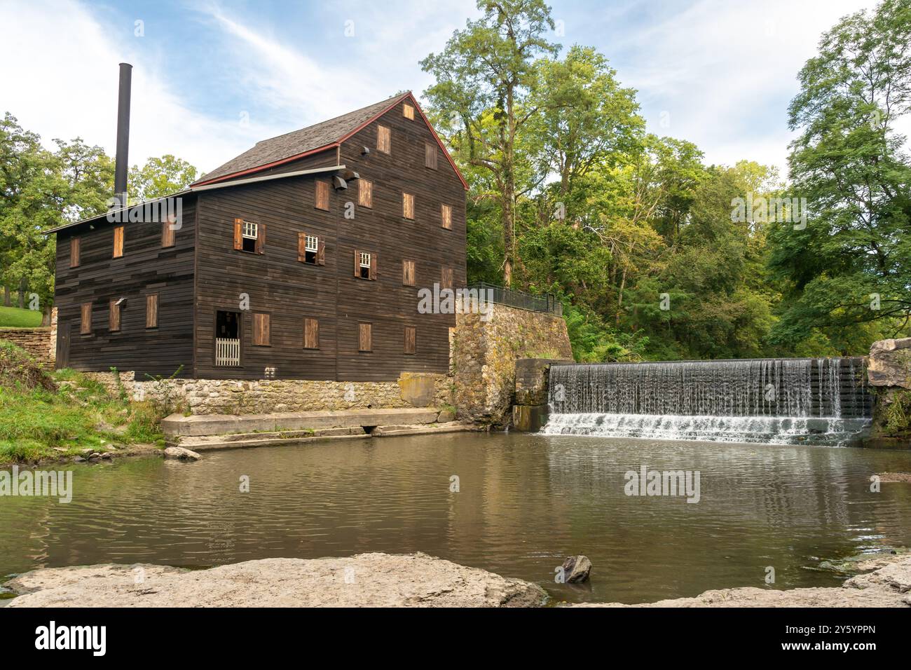 Pine Creek Grist Mill, built in 1848, on a sunny summer morning at ...