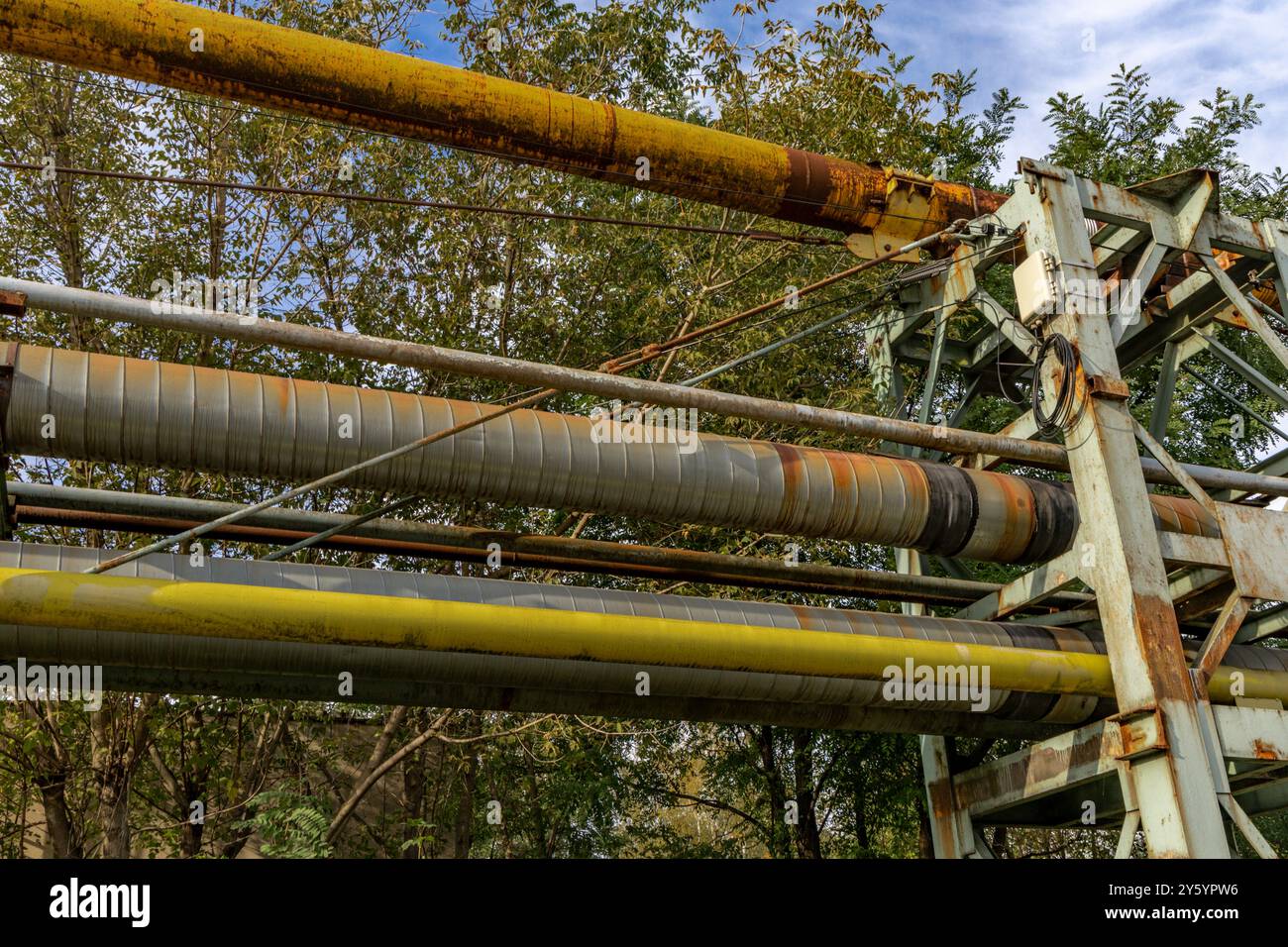 Old rusty pipeline, heating installation, water flow through old pipes ...