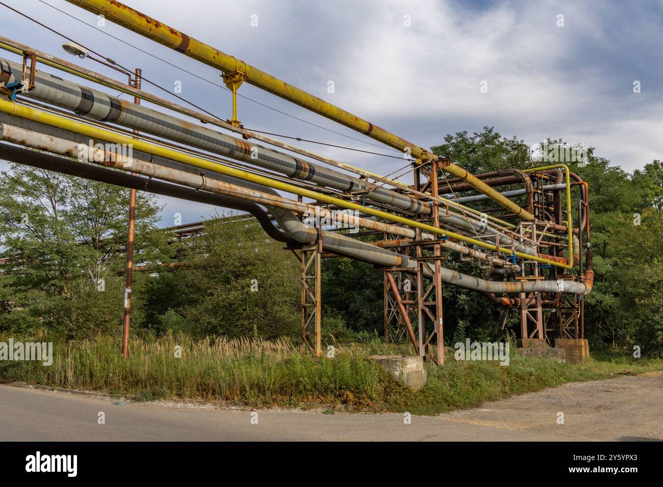 Old rusty pipeline, heating installation, water flow through old pipes ...