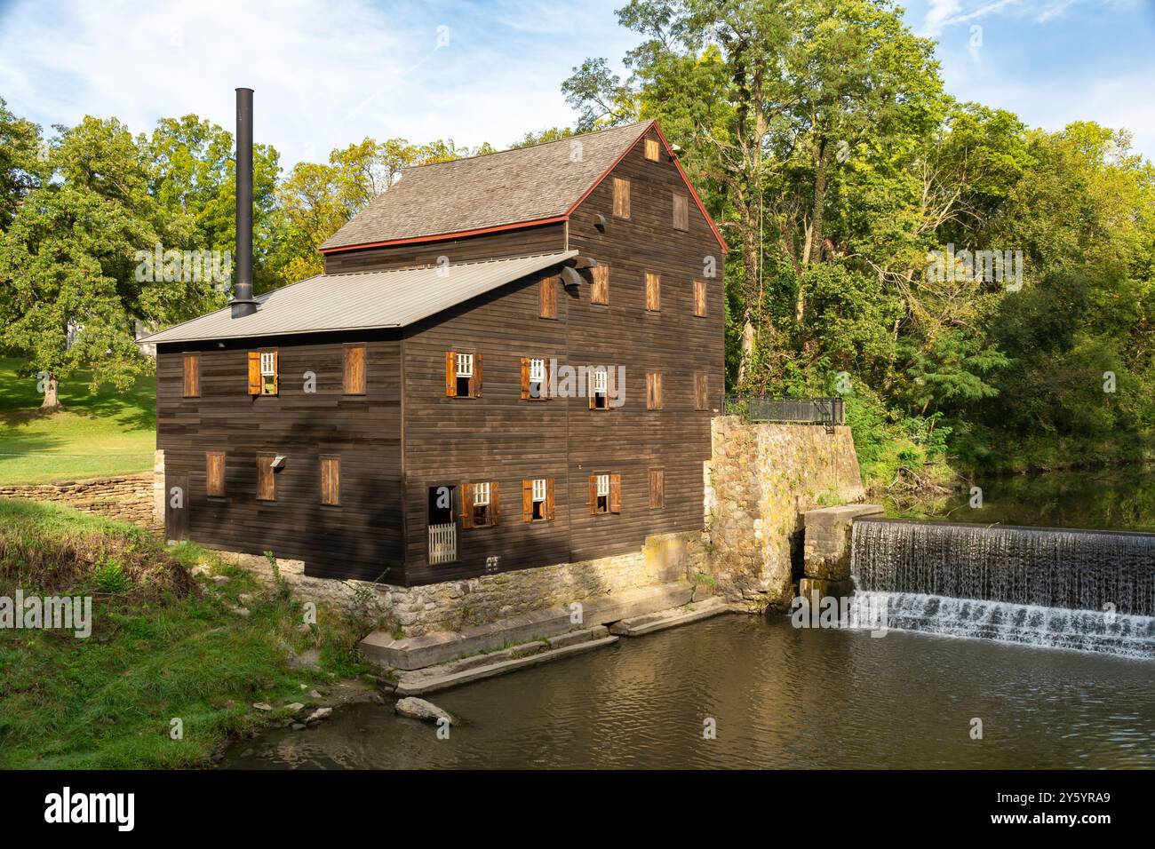 Pine Creek Grist Mill, built in 1848, on a sunny summer morning at ...