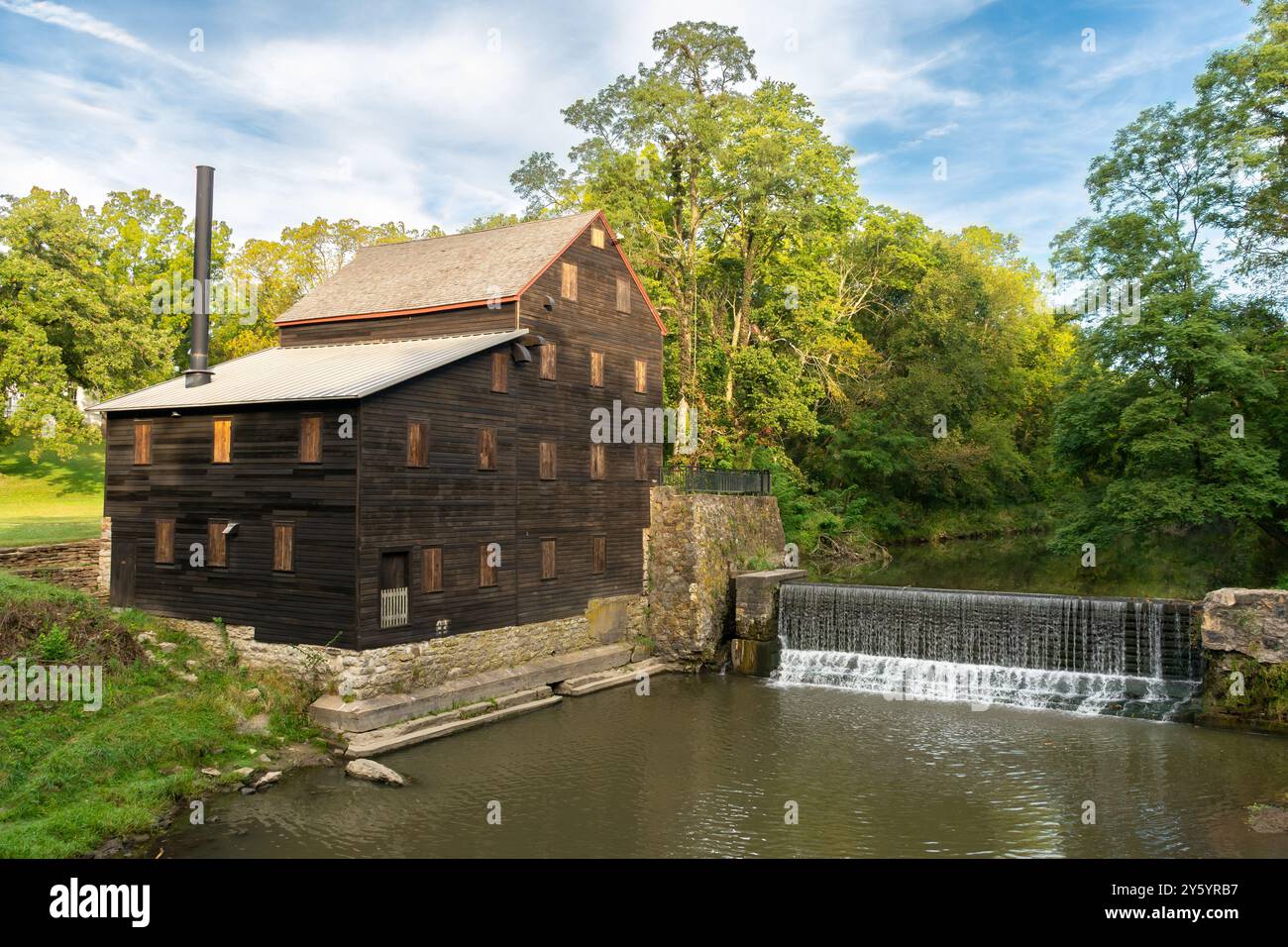Pine Creek Grist Mill, built in 1848, on a sunny summer morning at ...