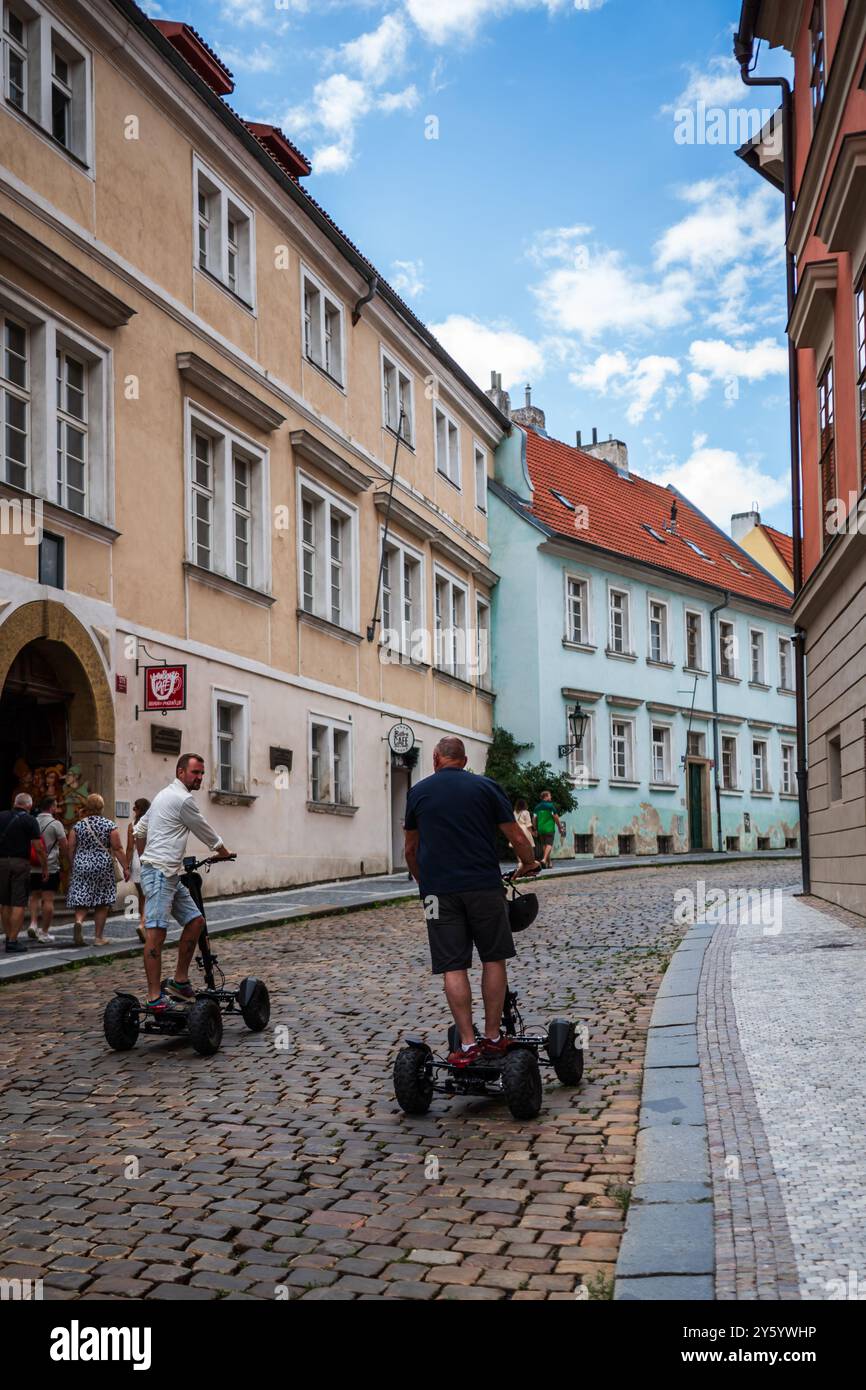 Tourists in Prague Castle complex with four wheeled scooters Stock ...