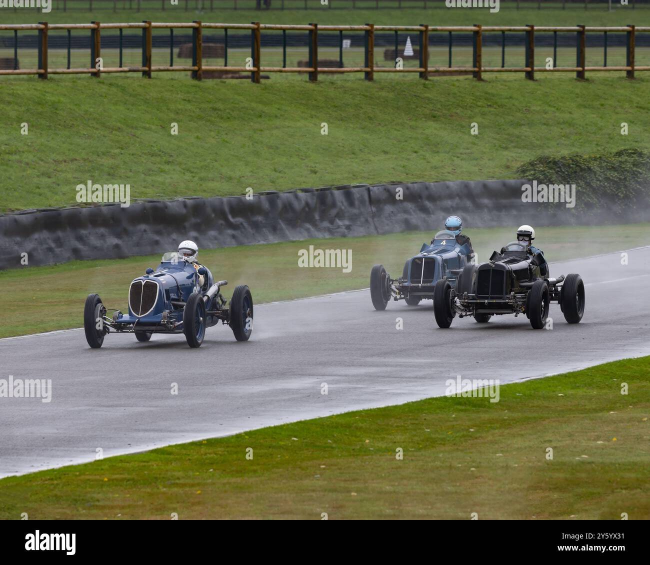 Three pre-war Grand Prix racing cars compete in the rain at the 2024 ...