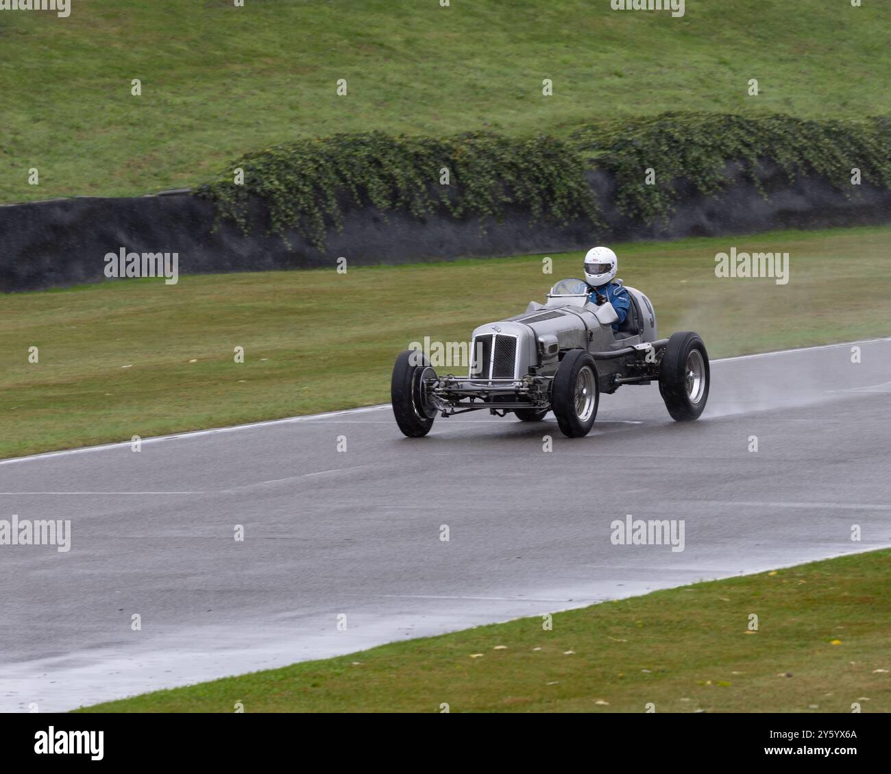 A 1936 ERA B-Type R11B voiturette class racing car in the rain at the ...