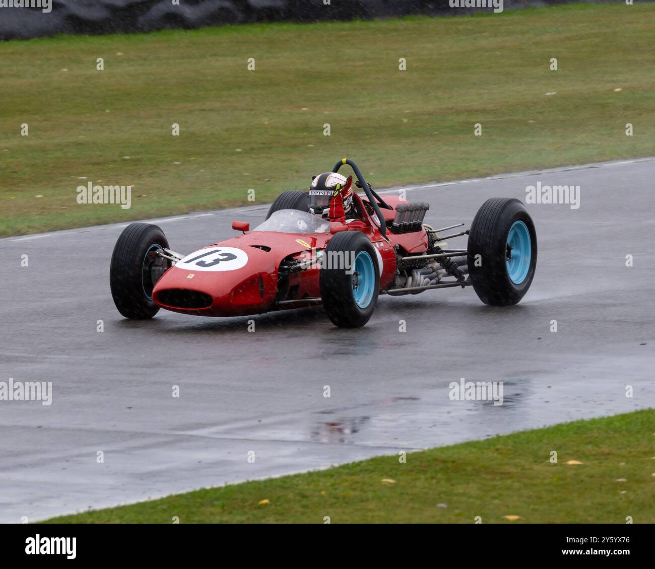 A 1965 Ferrari 1512 in the rain at the 2024 Goodwood Revival Stock ...