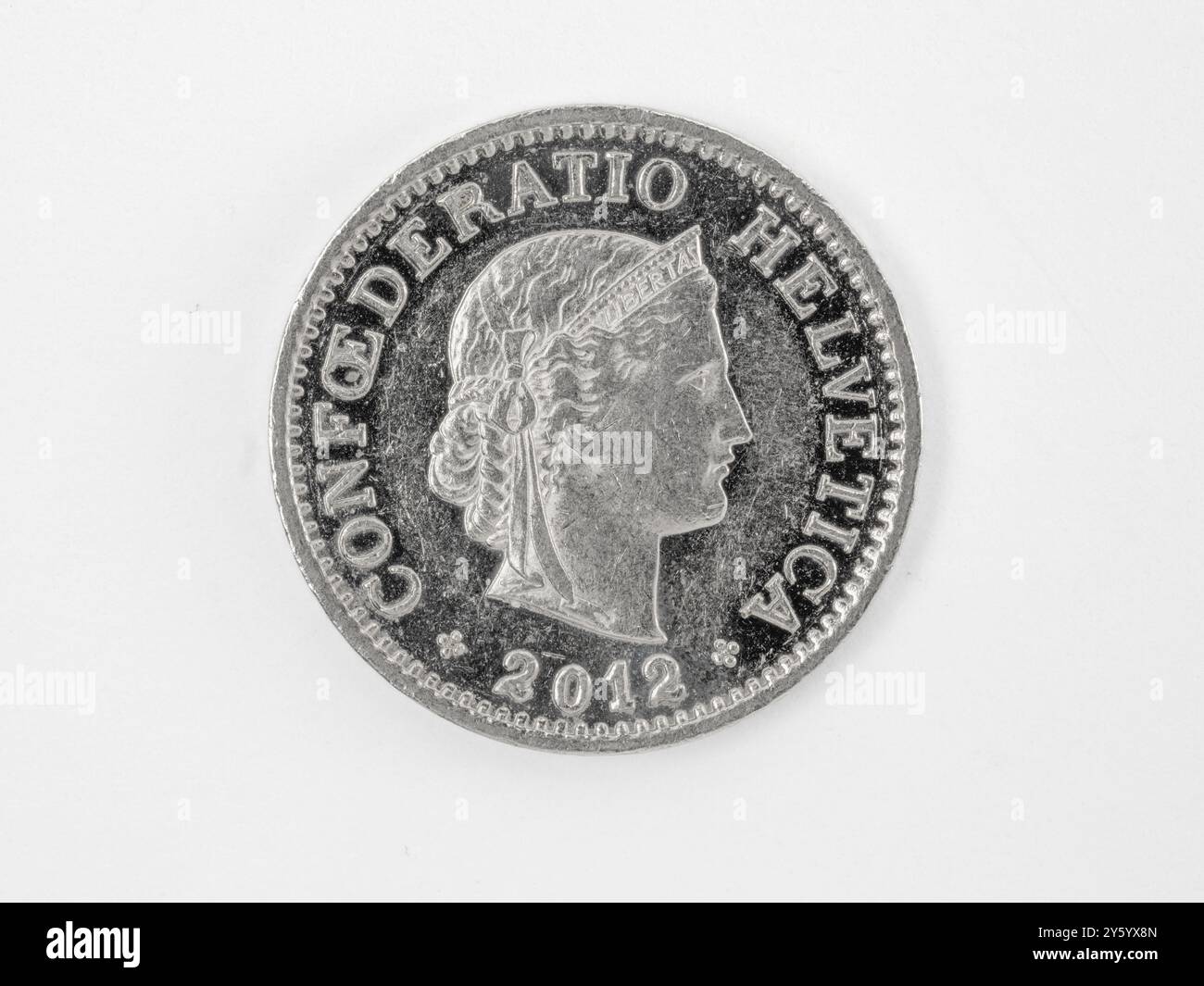 Close-up of a swiss ten cents coin, white background, back side Stock ...