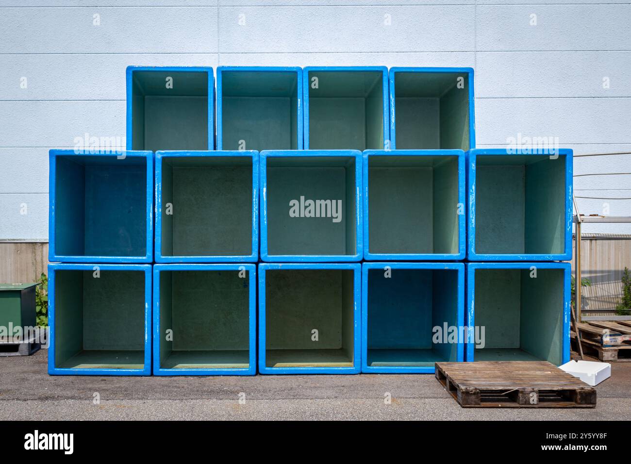 Stack of blue wooden cubic container boxes at harbour, Kanazawa, Japan ...