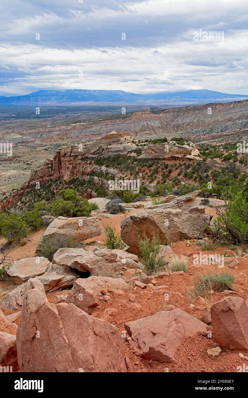 Multi colored stripes in eroding sandstone formations across canyon ...