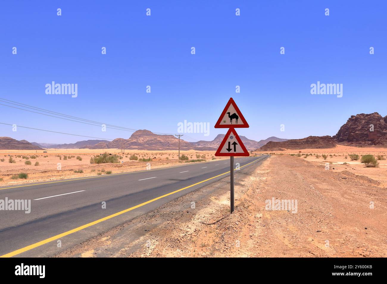 Funny road sign warning crossing camels in the Wadi Rum desert, Jordan ...